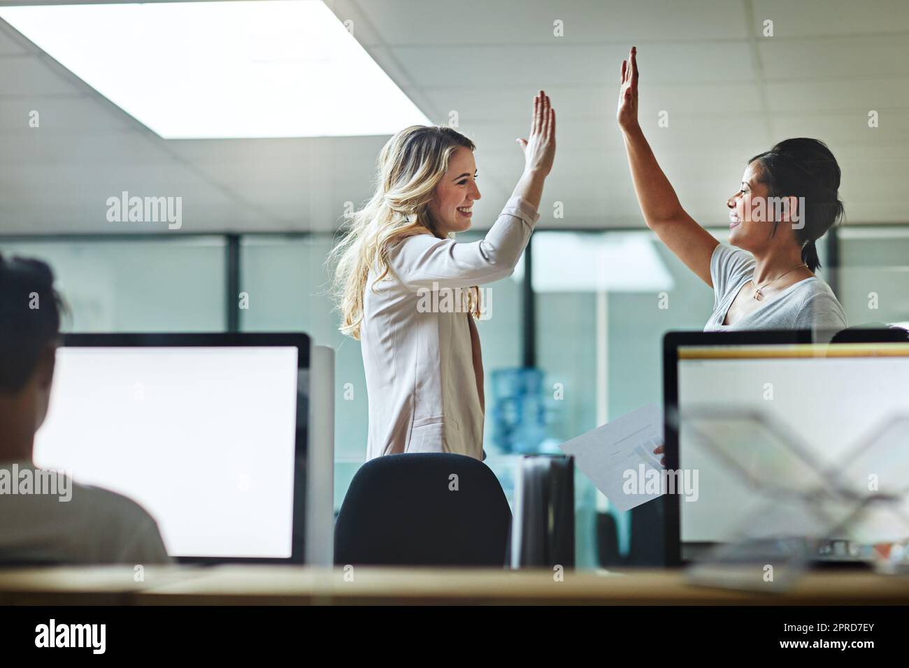 Coworker high five hi-res stock photography and images - Alamy