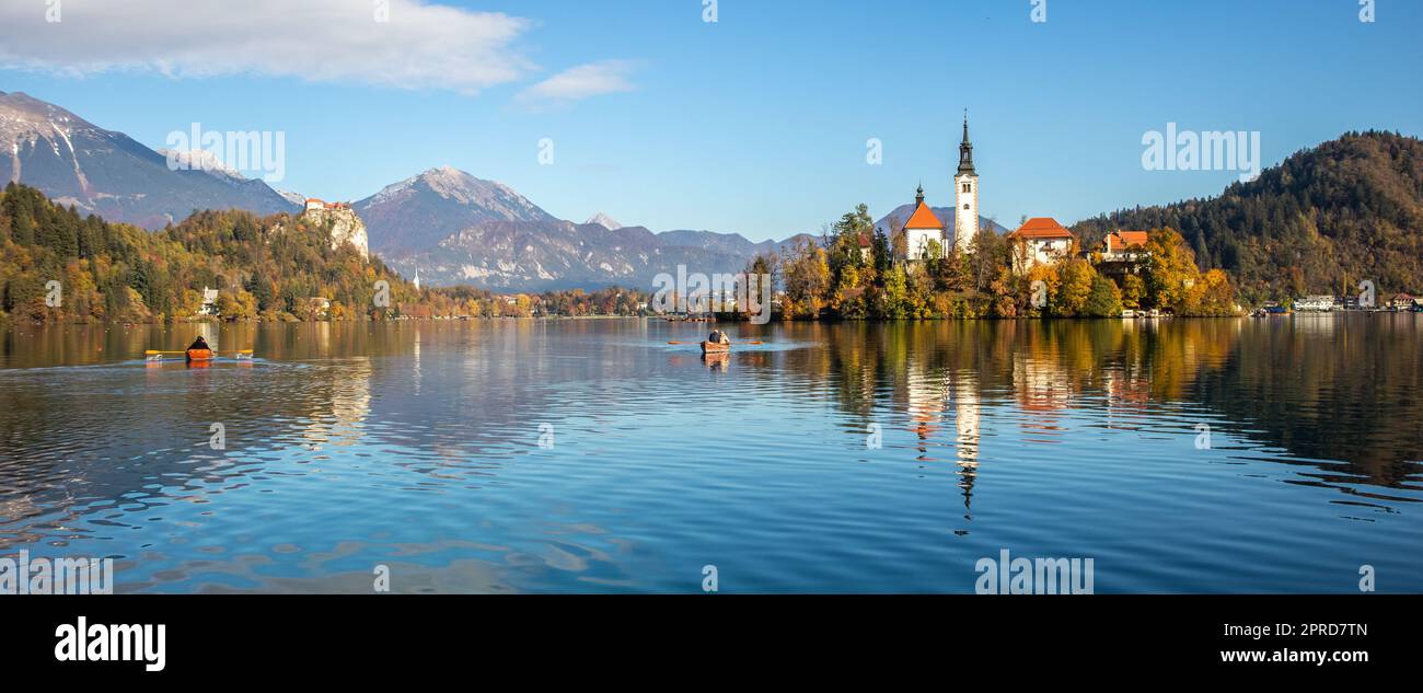 Panoramic view of Lake Bled with St. Marys Church of the Assumption on ...