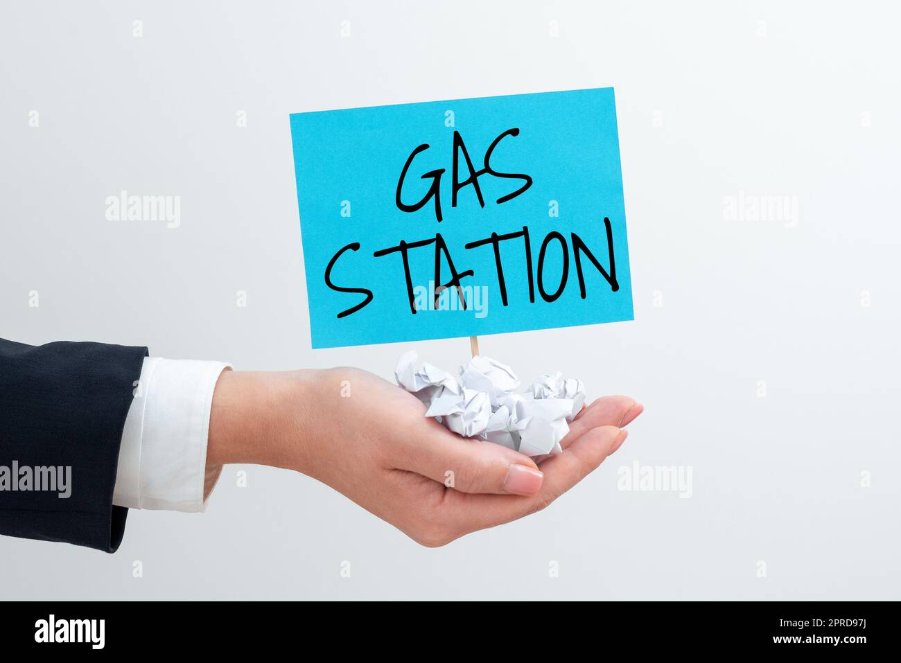 Hand writing sign Gas Station. Word Written on for servicing motor ...