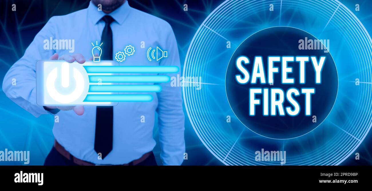 Hand writing sign Safety First. Business overview Avoid any unnecessary ...