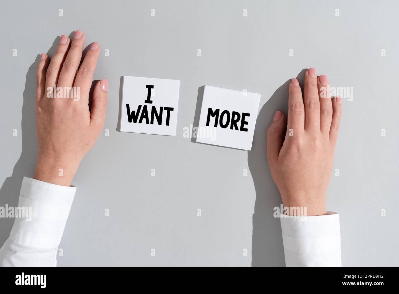 Hand writing sign I Want More. Business overview Not having enough of ...