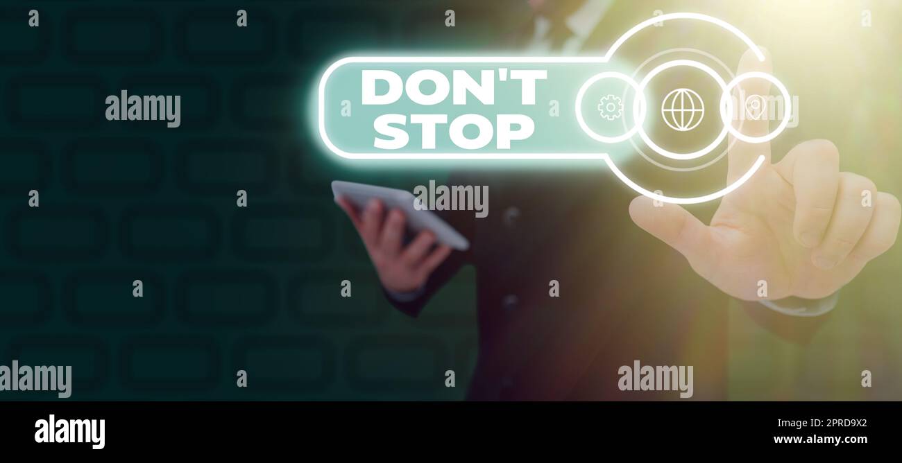 Text sign showing Don T Not Stop. Word Written on Continue what had been doing without rendering ...