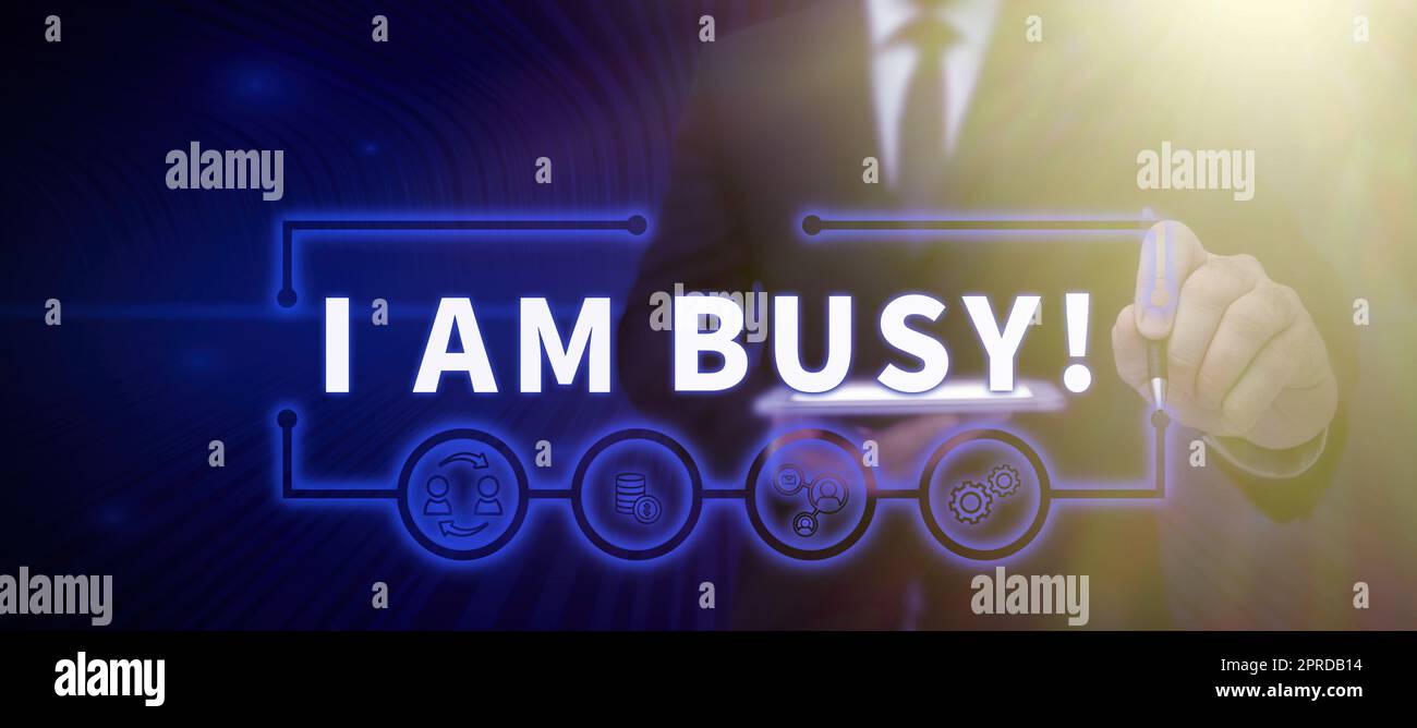 Sign displaying I Am Busy. Conceptual photo To have a lot of work to do ...