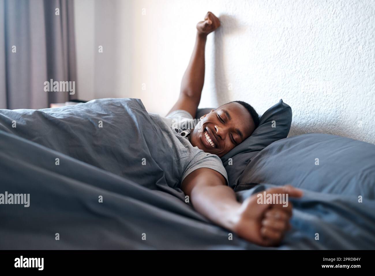 Bed handsome hi-res stock photography and images - Alamy