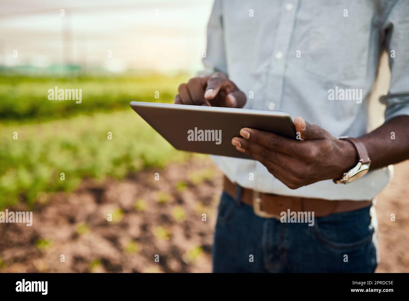 Its the easiest way to run a farm. an unrecognizable male farmer using ...
