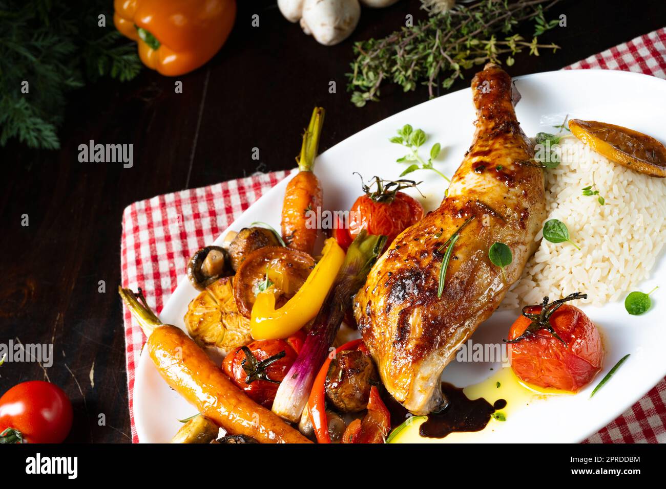 Rustic fried chicken legs with assorted vegetables and rice Stock Photo ...