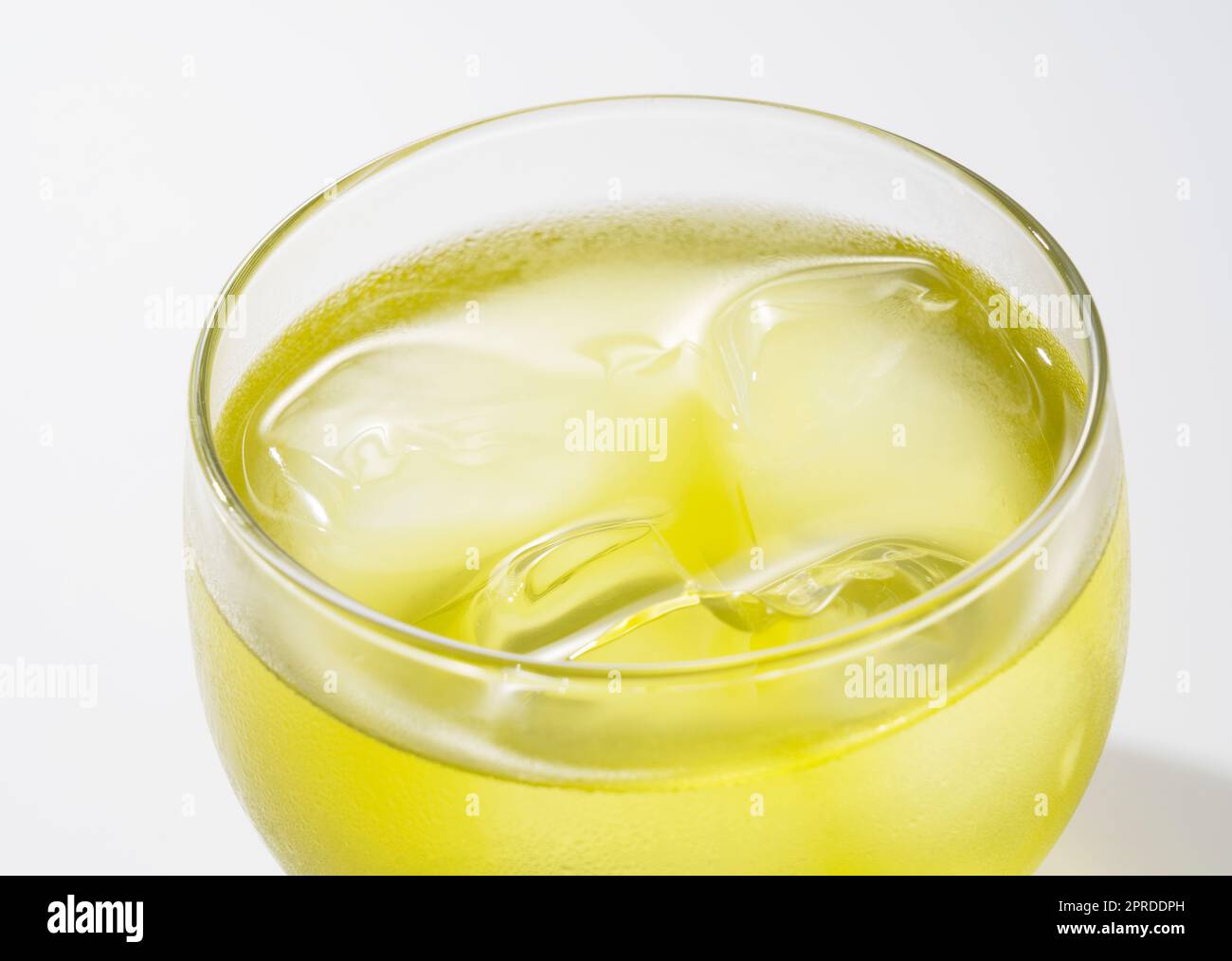 Cold green tea placed on a white background Stock Photo - Alamy