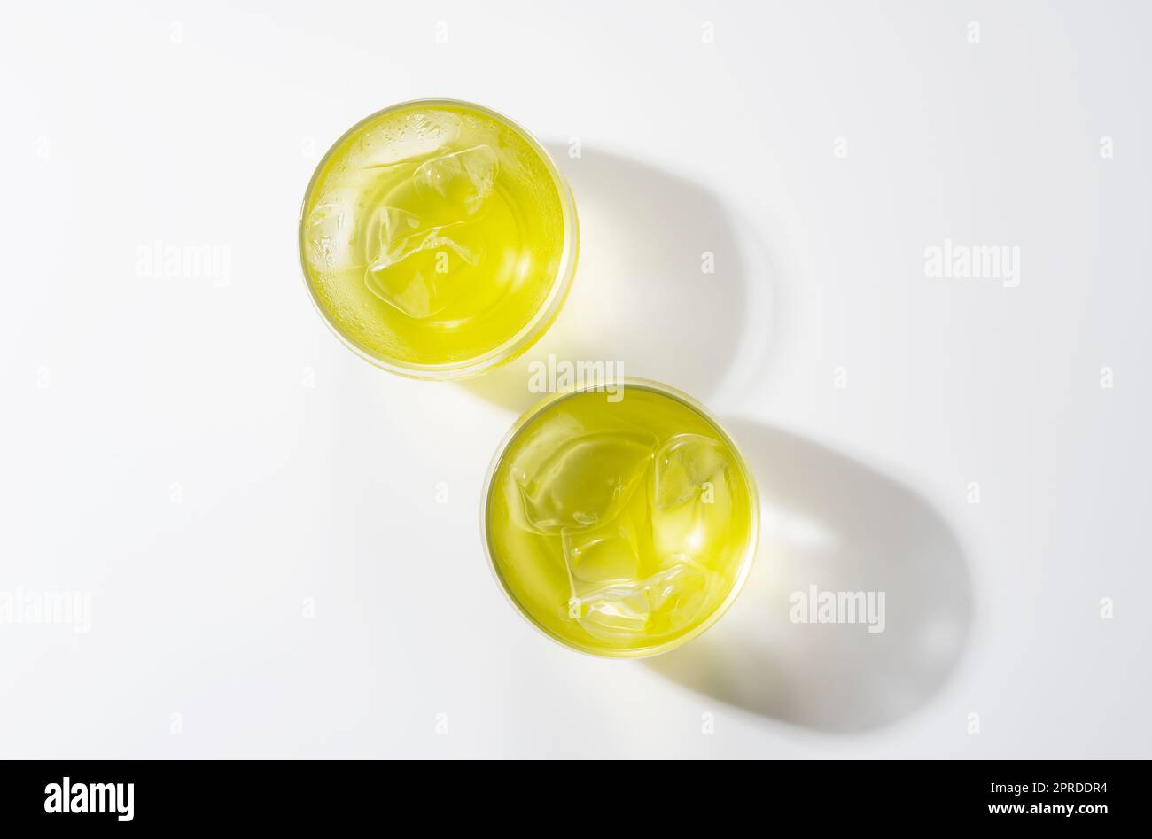Cold green tea placed on a white background Stock Photo - Alamy