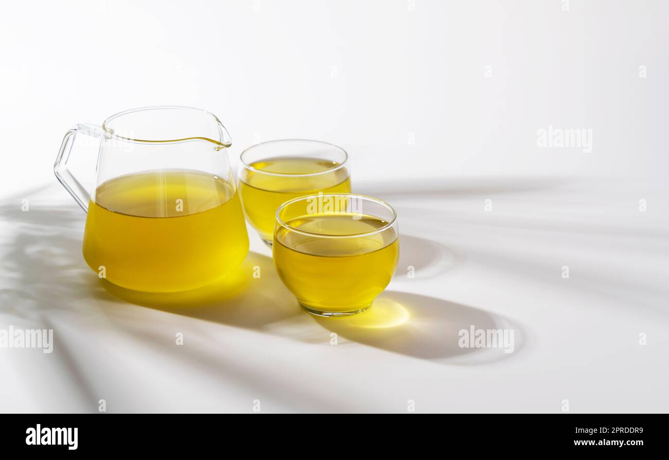 Cold green tea placed on a white background Stock Photo - Alamy