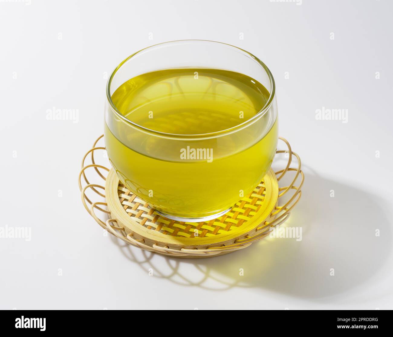 Cold green tea placed on a white background Stock Photo - Alamy
