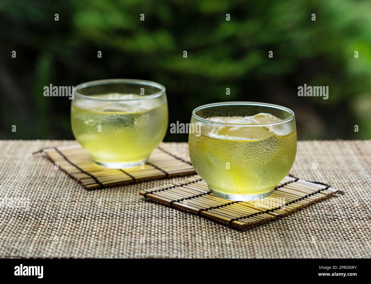 Cold Japanese green tea placed in a place with a view of the garden ...