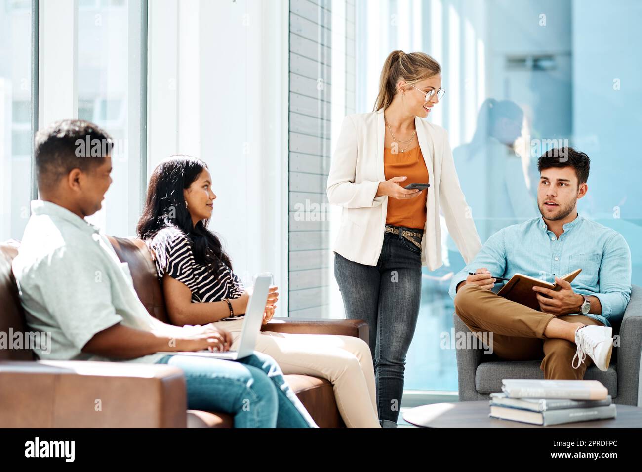 Giving everyone a chance to voice their big ideas. a group of ...