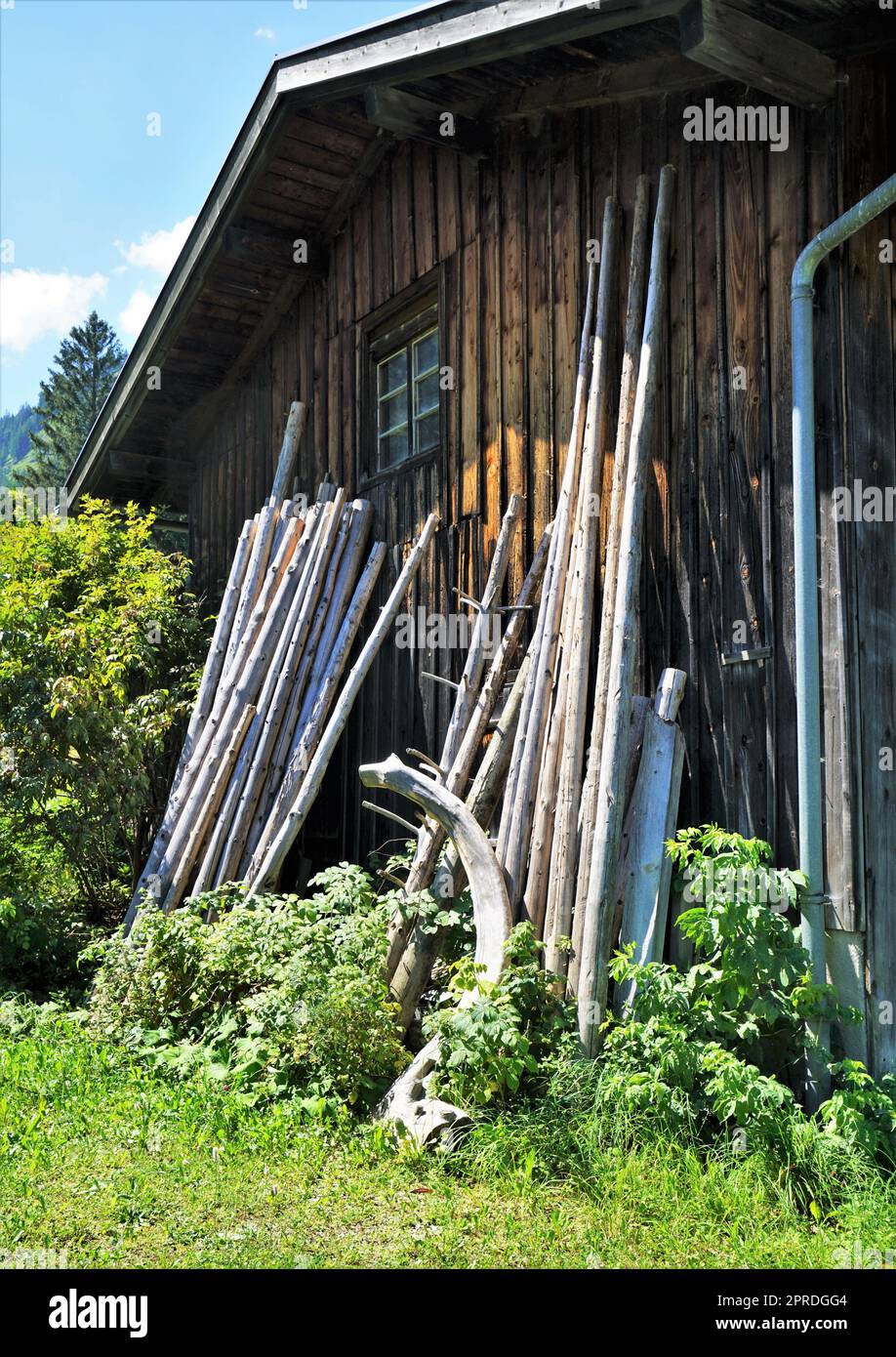 Wooden shed on a meadow under a blue sky Stock Photo - Alamy