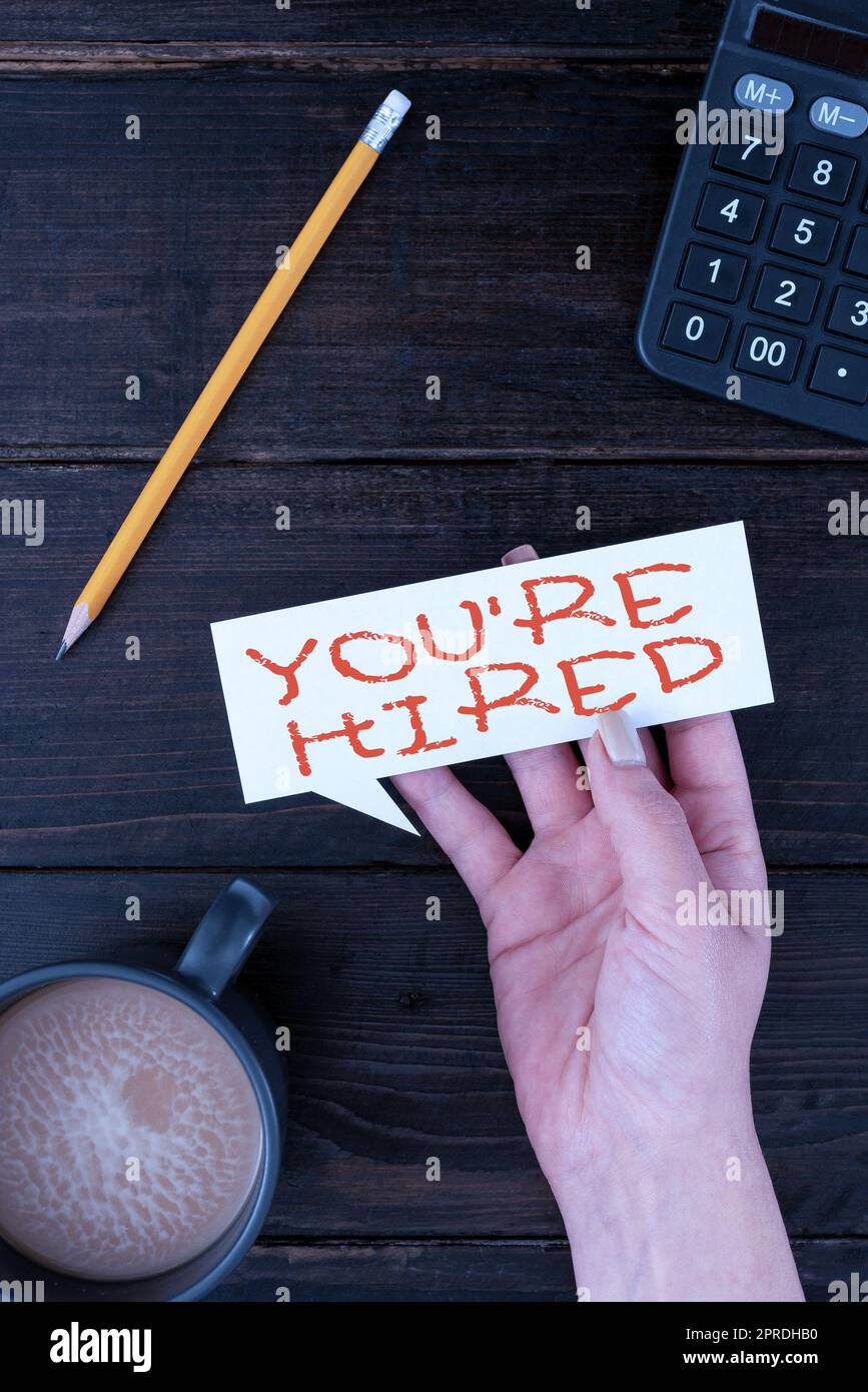 Sign displaying You Re Are Hired. Internet Concept New Job Employed ...