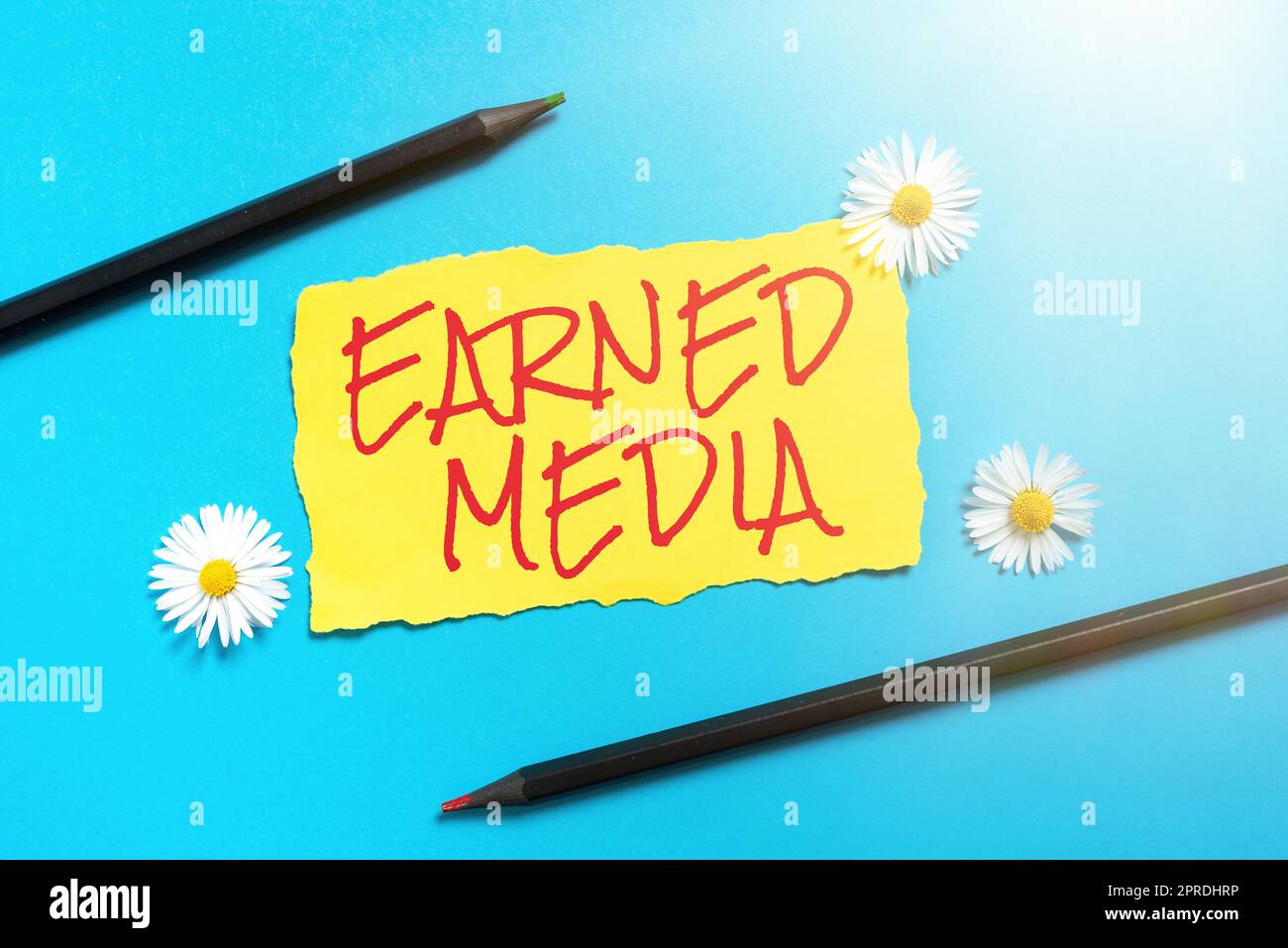 Sign displaying Earned Media. Business overview Publicity gained ...