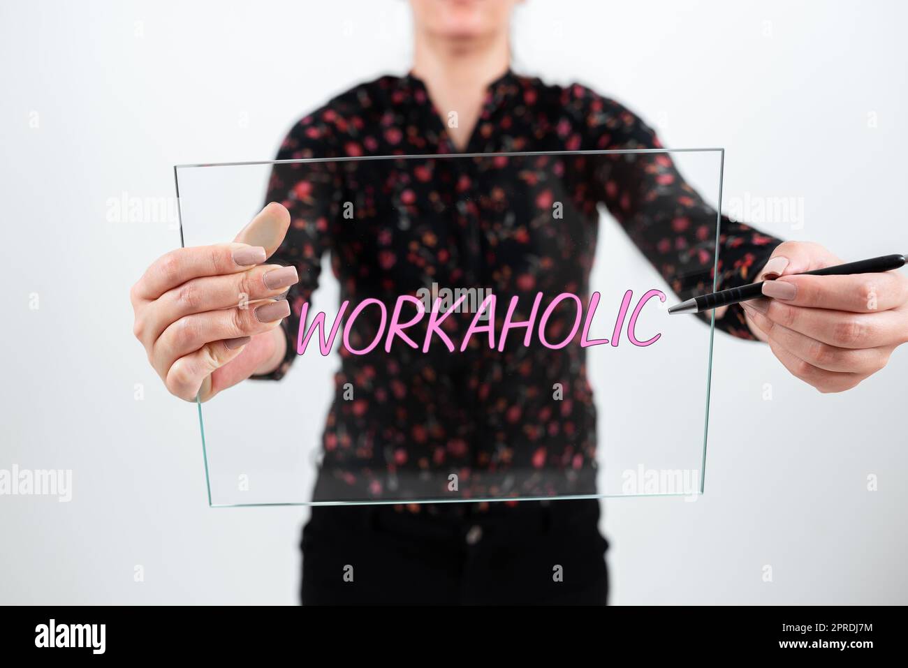 Sign displaying Workaholic. Word for Person who compulsively works ...