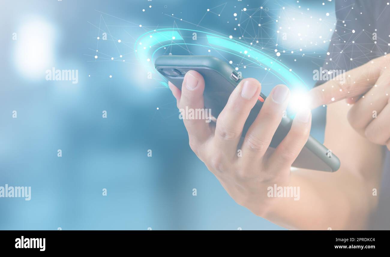 Technology innovation and communication concept of a man using a mobile ...