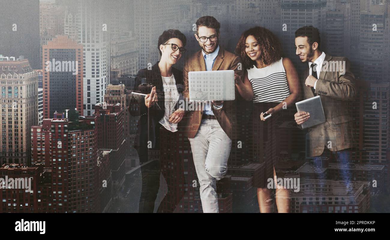 Sharing is easier when youre connected. Studio shot of a group of ...