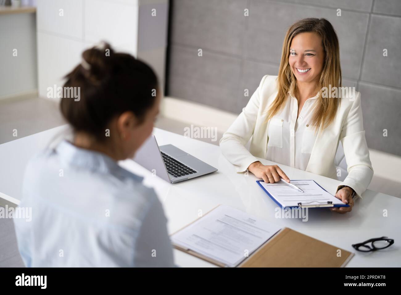 Girl interview desk hi-res stock photography and images - Alamy