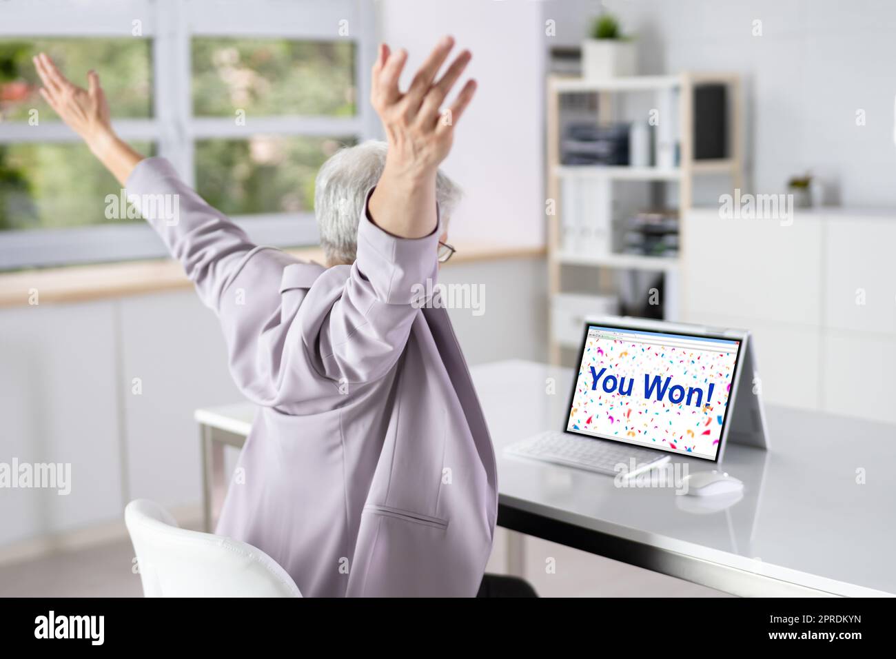 Senior old woman celebrating win hi-res stock photography and images ...