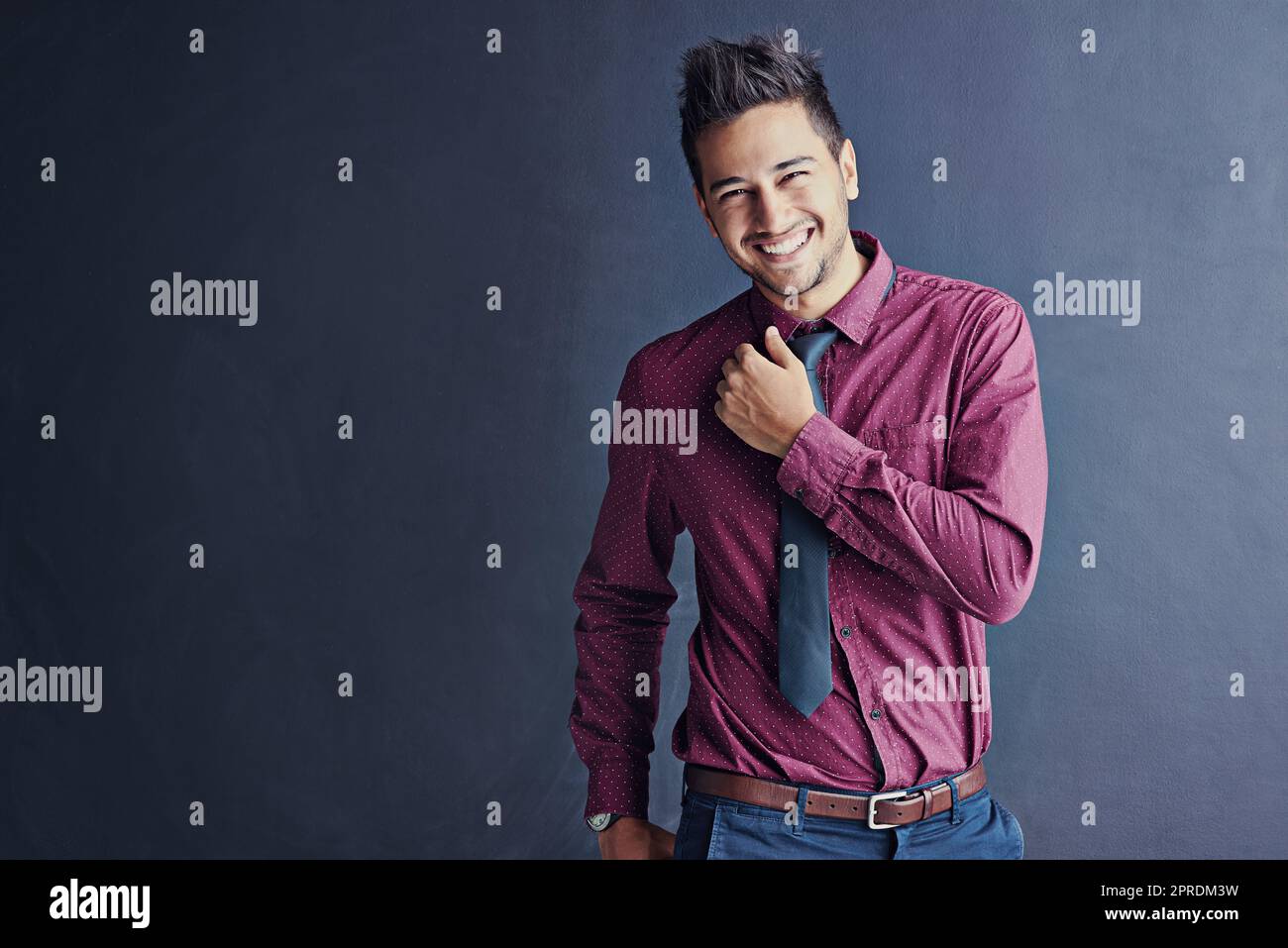 Success is the best feeling in the world. Studio portrait of a handsome ...