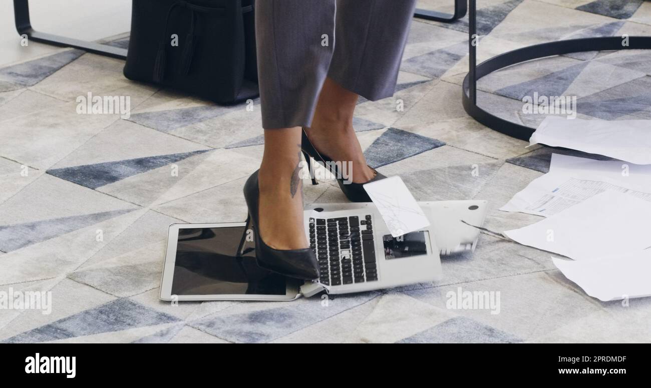 Shes had enough of technology. an unrecognizable businesswoman breaking ...