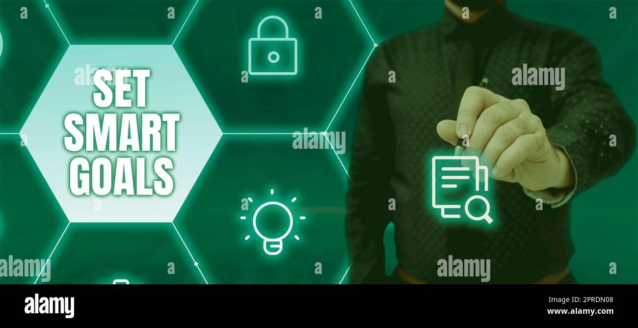 Hand writing sign Set Smart Goals. Word for Establish achievable ...