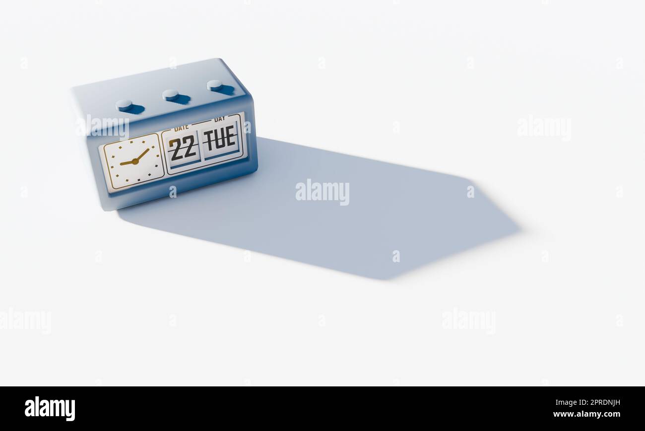 ALARM CLOCK DISPLAYING TEN PAST NINE, TUESDAY 22 Stock Photo - Alamy