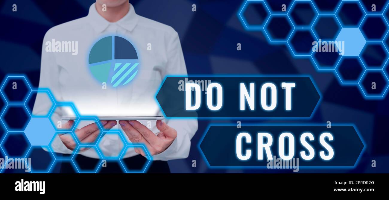 Text sign showing Do Not Cross. Word for Crossing is forbidden dangerous caution warning not to ...