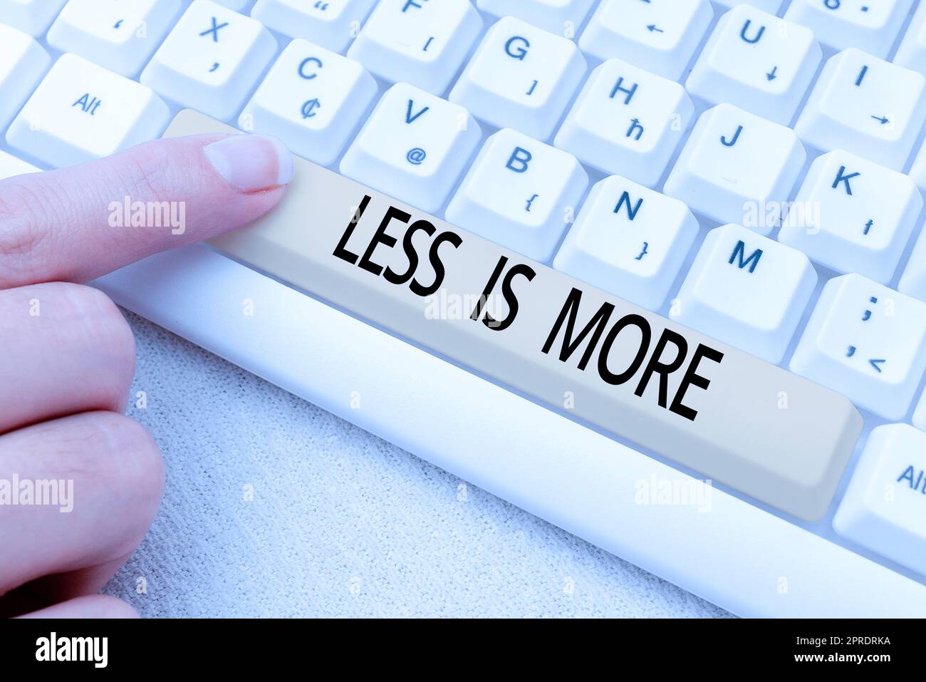 Text caption presenting Less Is More. Word for Minimalist approach to ...