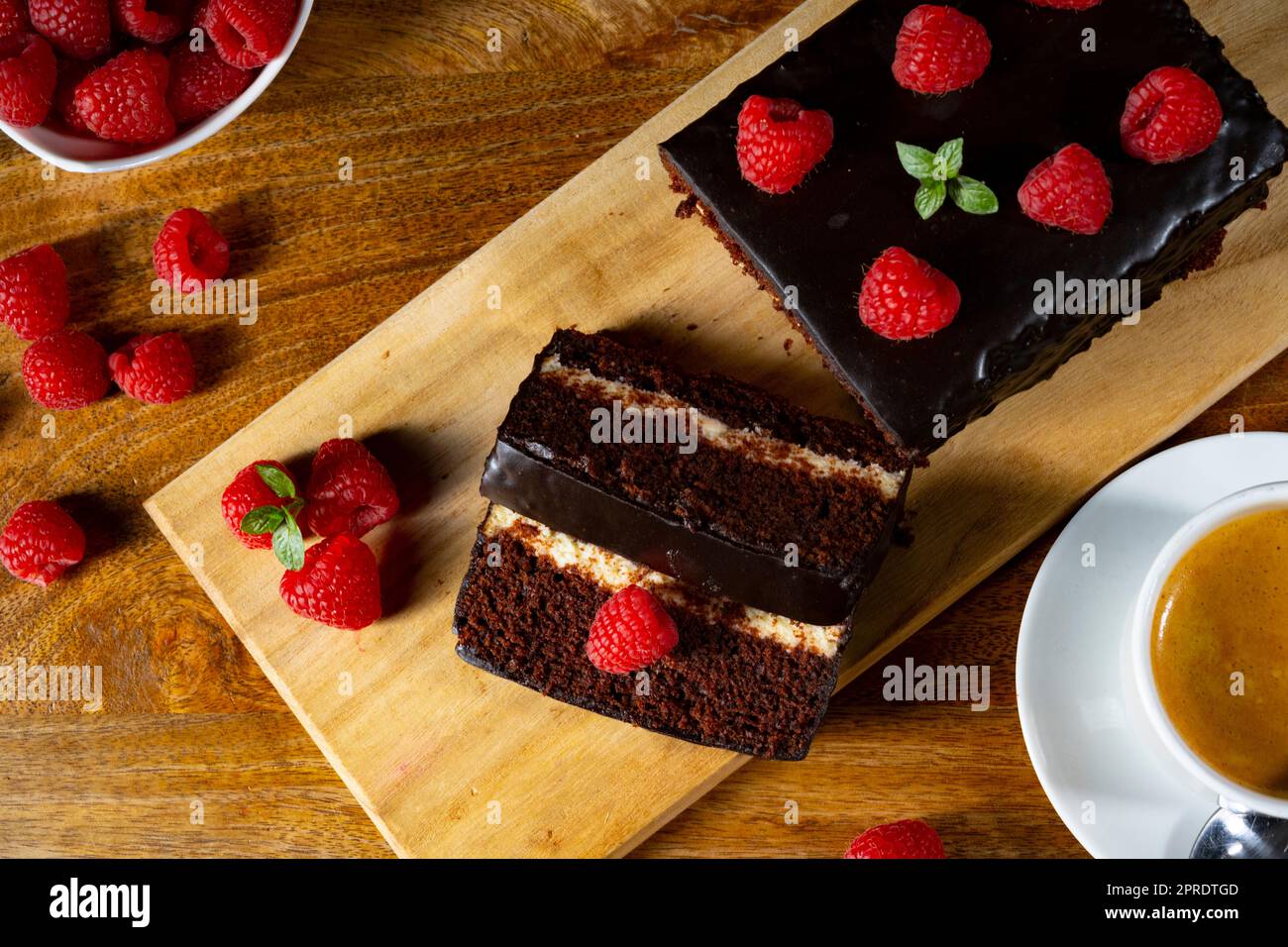 Chocolate cake with raspberries and coffee Stock Photo - Alamy