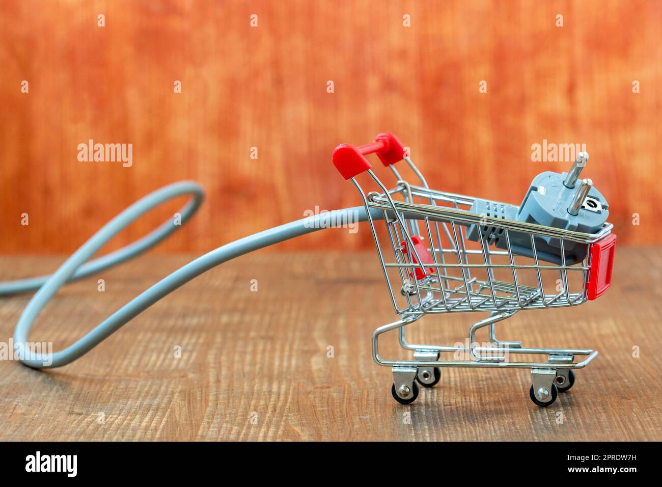 Electric plug in small shopping trolley Stock Photo - Alamy