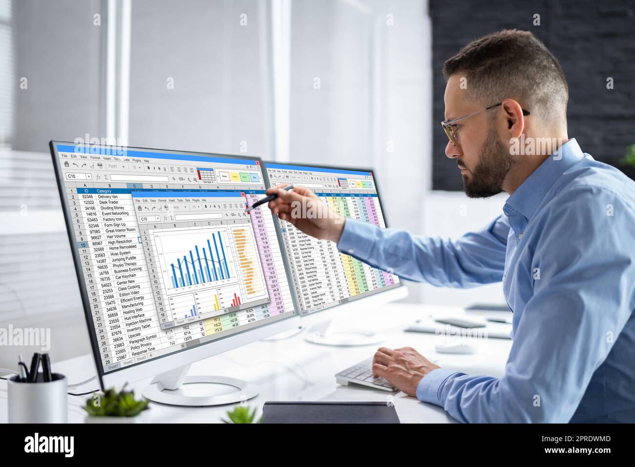 Analyst Working With Spreadsheet Business Data Stock Photo - Alamy