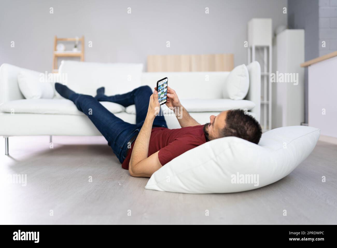 Man With Lethargy And Fatigue On Couch Stock Photo - Alamy