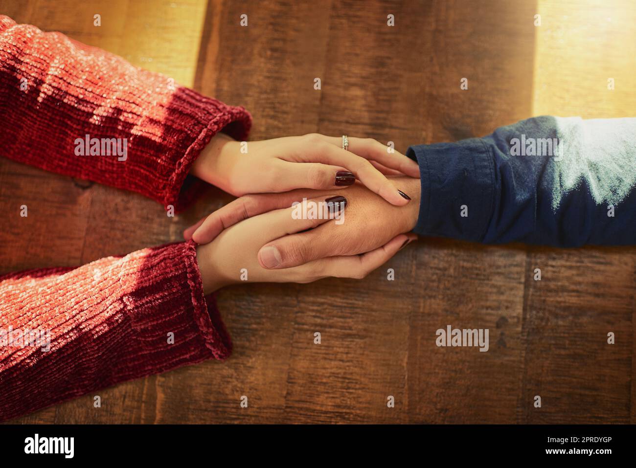 Woman holding out two hands hi-res stock photography and images - Alamy