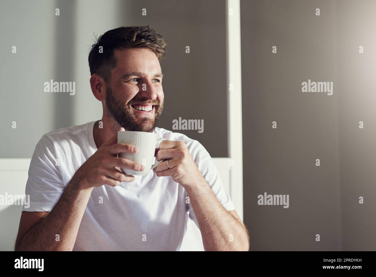Handsome man drinking tea in hi-res stock photography and images - Alamy