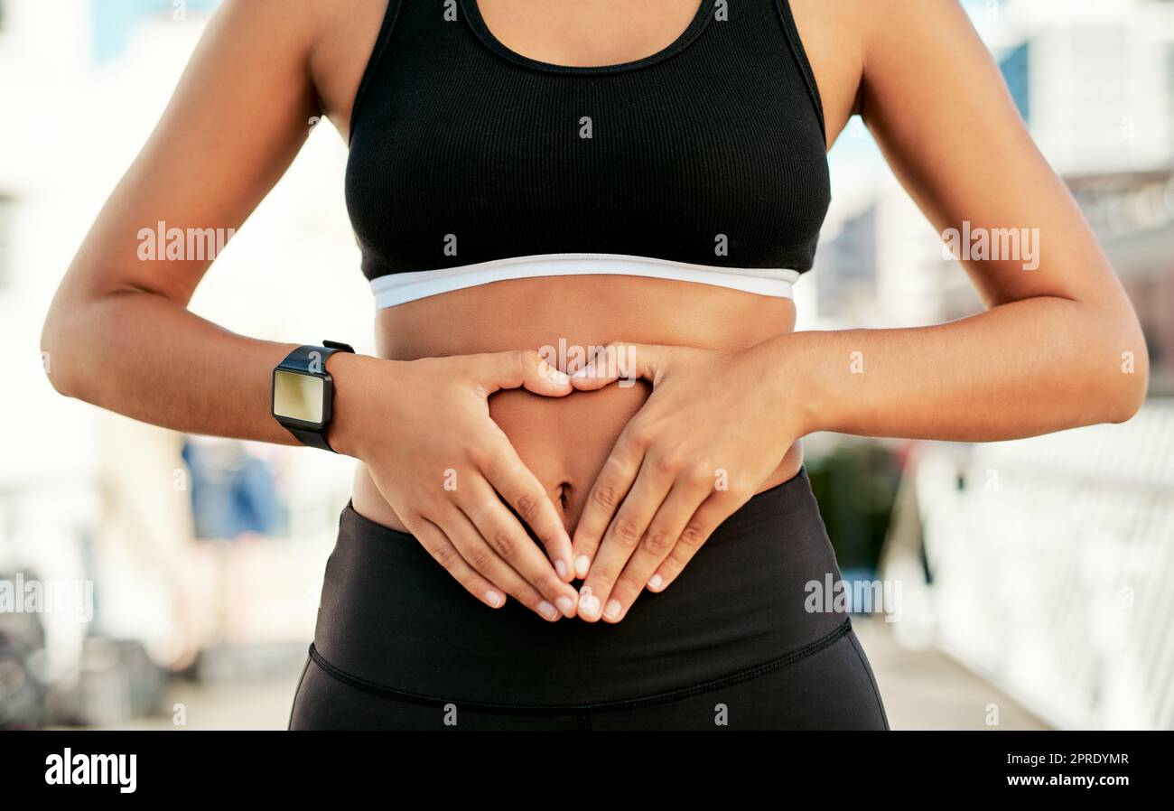 Woman stomach heart shape hi-res stock photography and images - Alamy