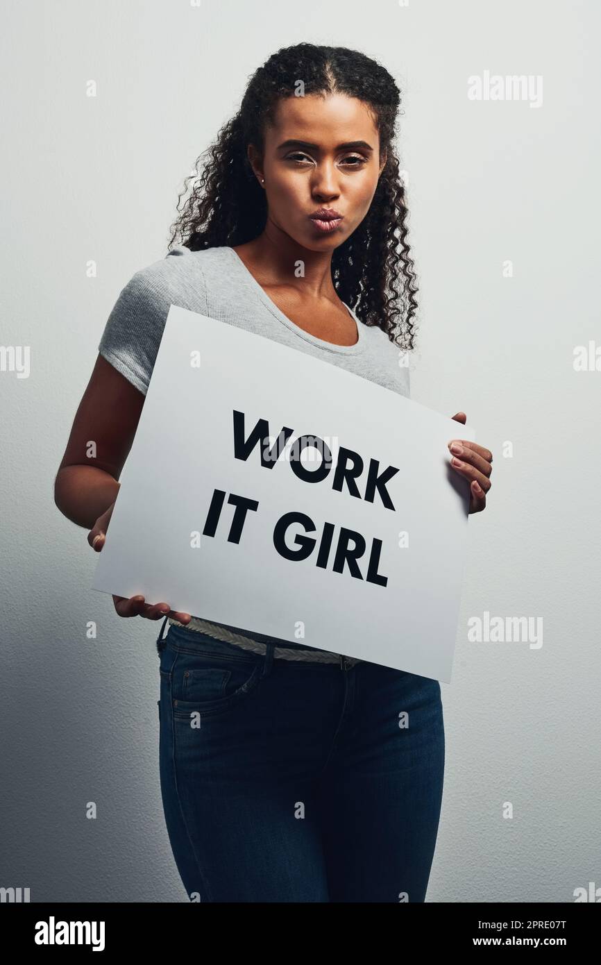 You can do it, you just have to work it. Studio shot of an attractive ...