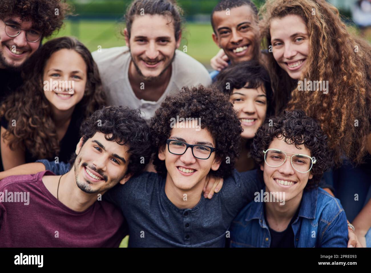 Group friends standing close other hi-res stock photography and images ...