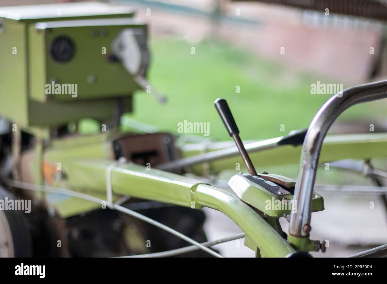 Typical heavy diesel walking tractor with trailer. Agricultural ...