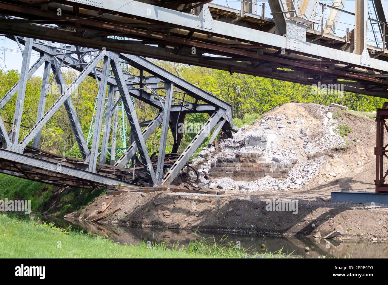The blown up railway bridge over the Irpen River. War in Ukraine ...