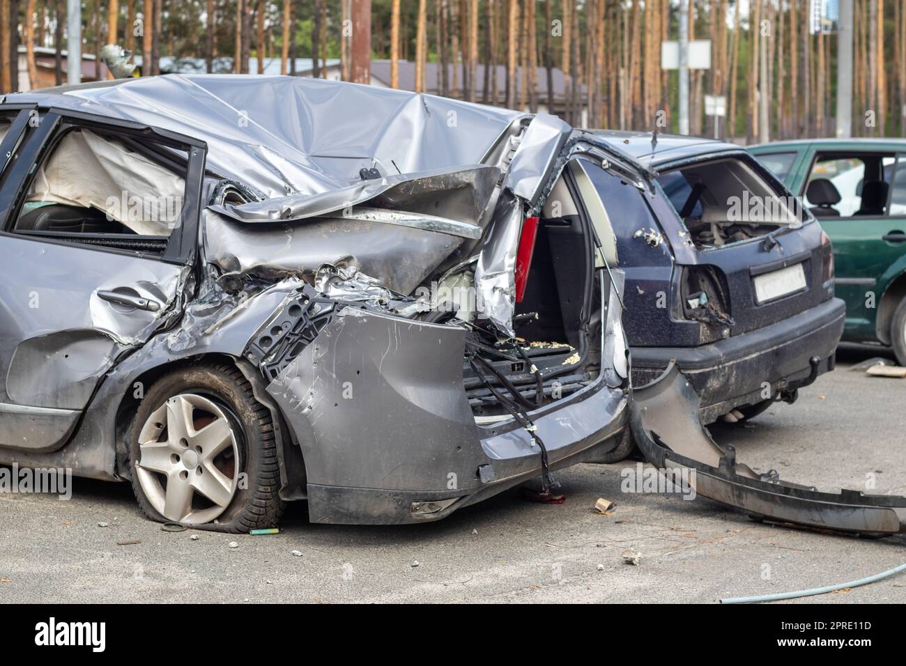Broken car after a traffic accident in the parking lot of a repair ...