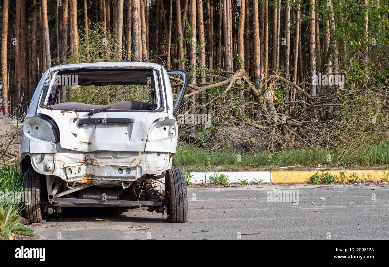 Broken minicar after a traffic accident in the parking lot of a repair ...