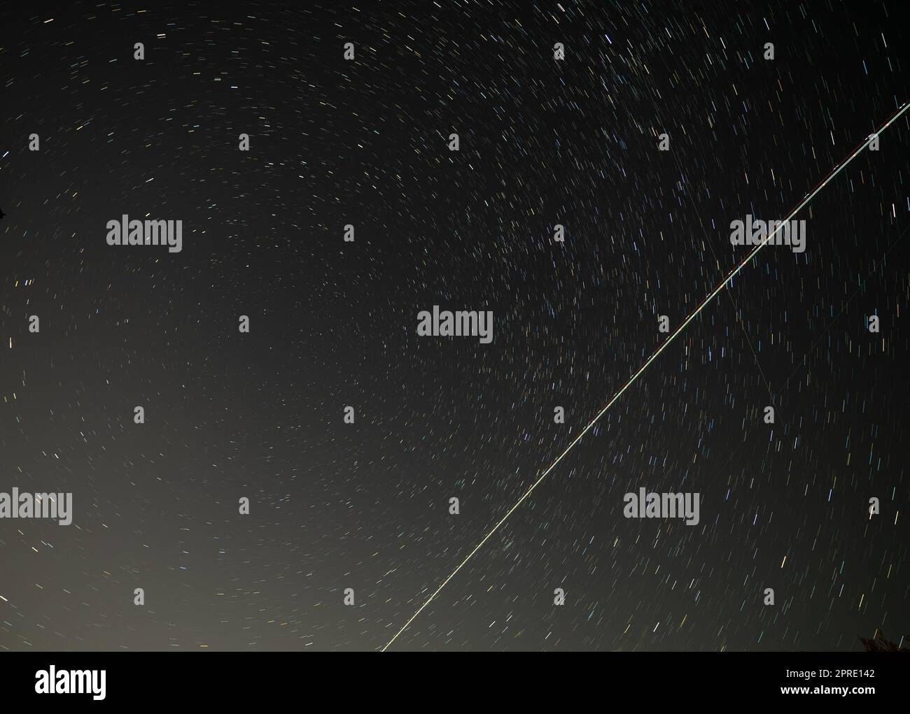 Star Trails and Contrails Stock Photo - Alamy