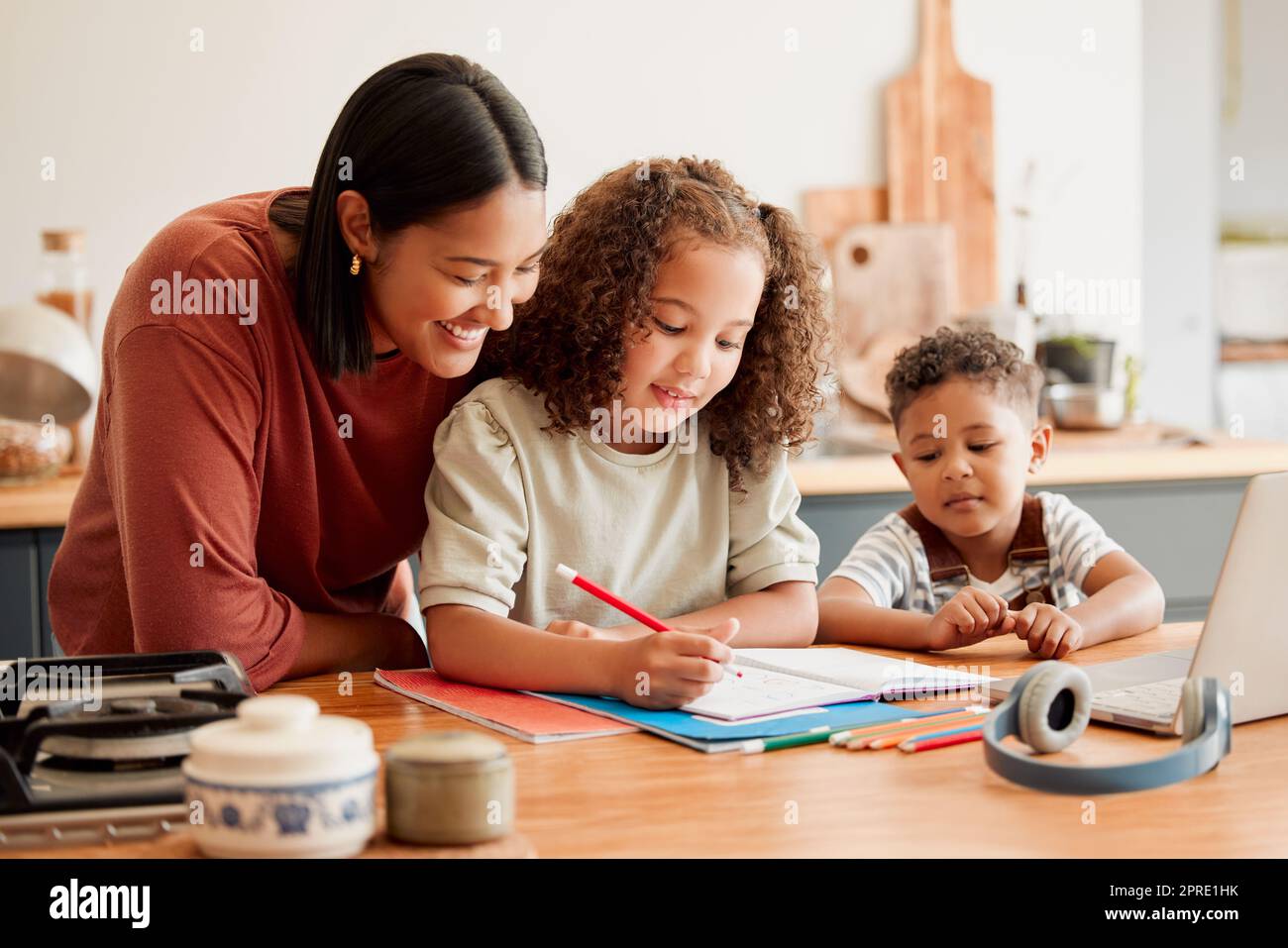 Mother teaching, learning and education with child studying, doing ...