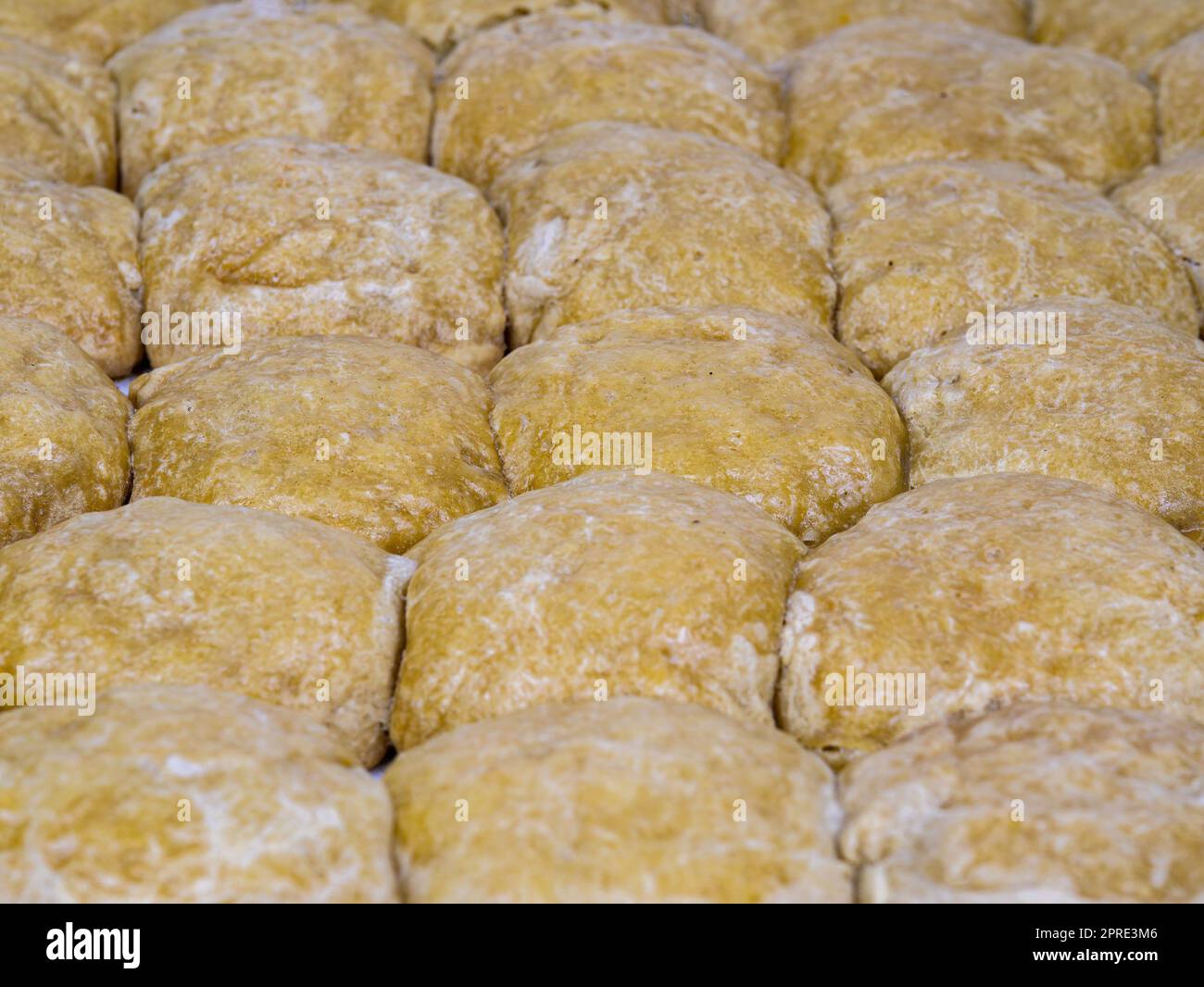Culinary flour pastries laid out in a row Stock Photo - Alamy