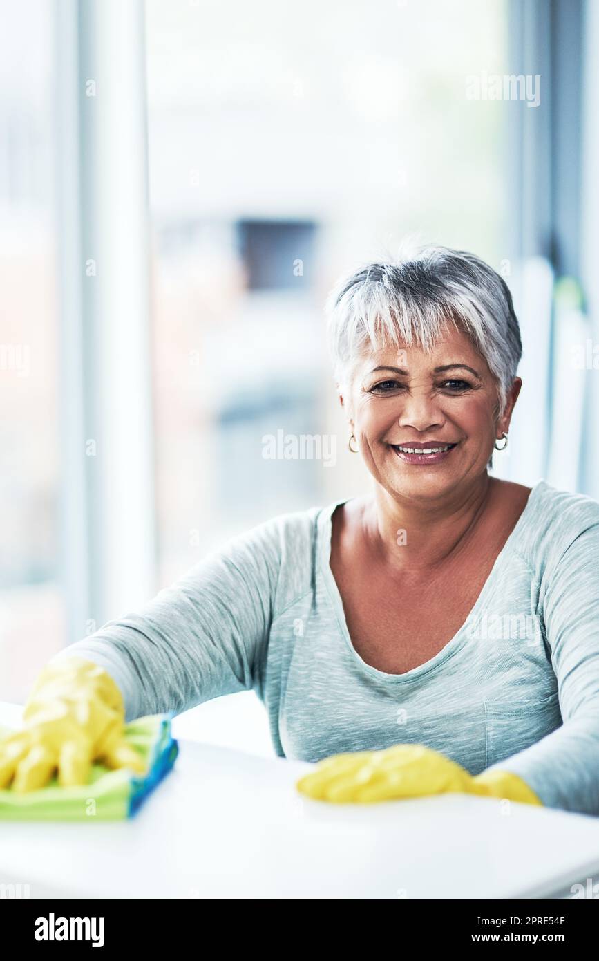 Not A Germ In Sight Portrait Of A Happy Mature Woman Wearing Rubber