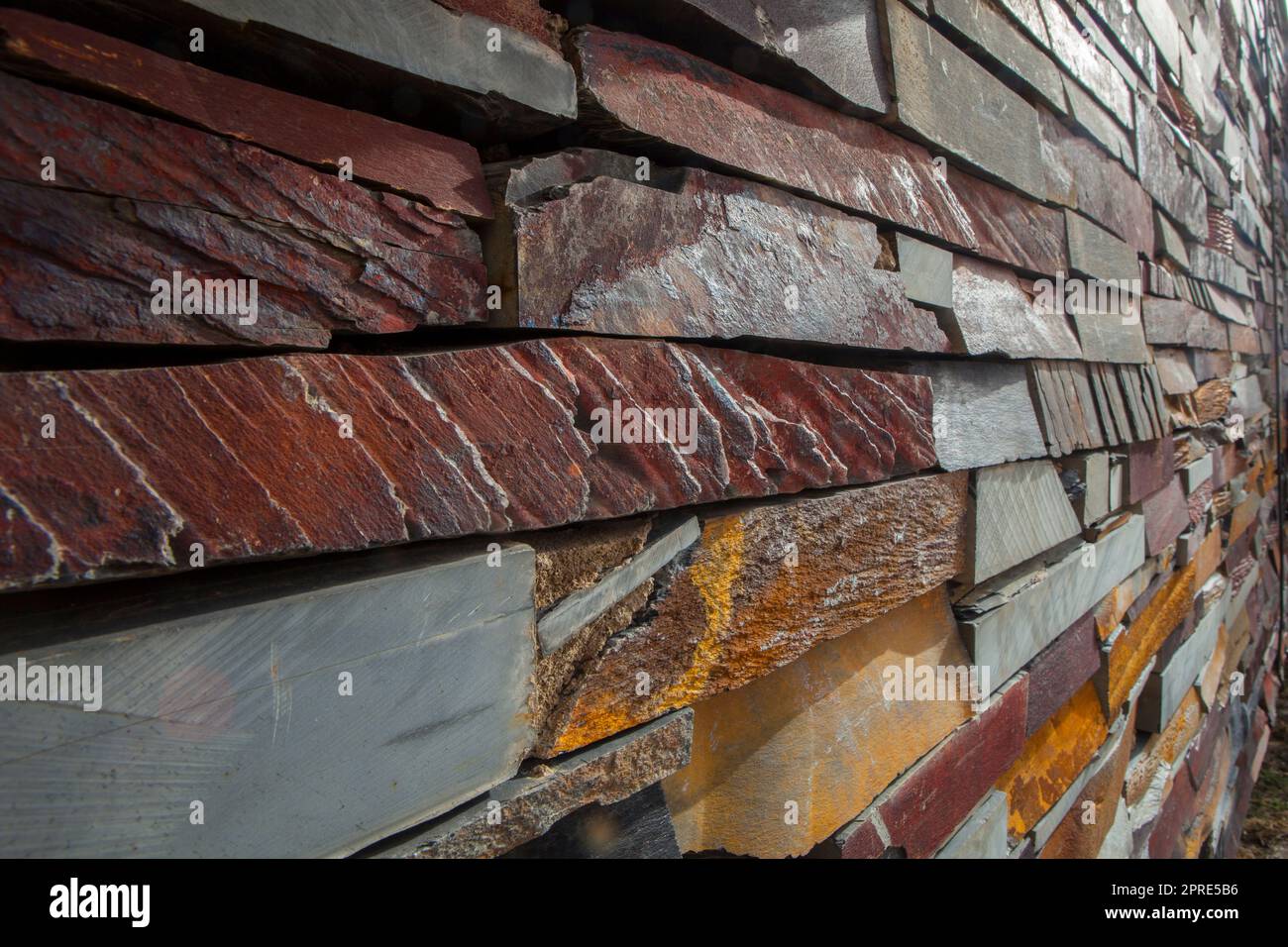 Natural colorful rust slate wall. Thick Slabs Stock Photo - Alamy
