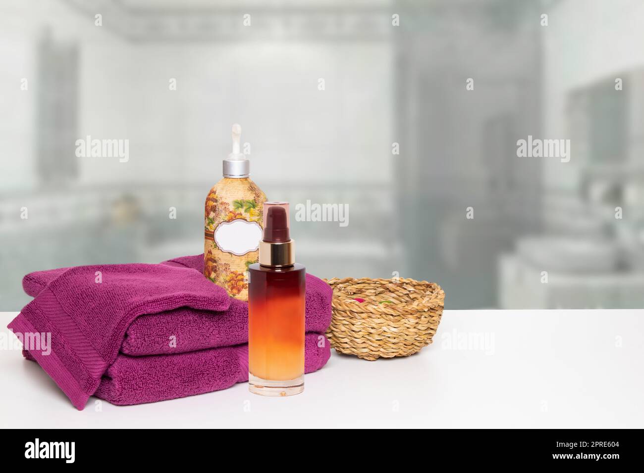 A beautiful composition of spa treatment on the table with towels ...