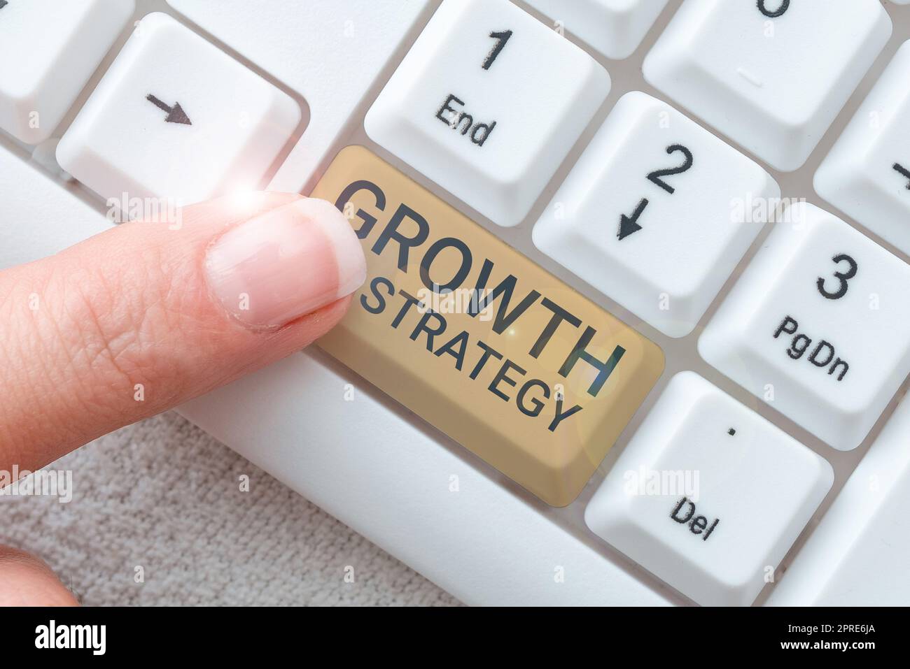 Hand writing sign Growth StrategyStrategy aimed at winning larger ...